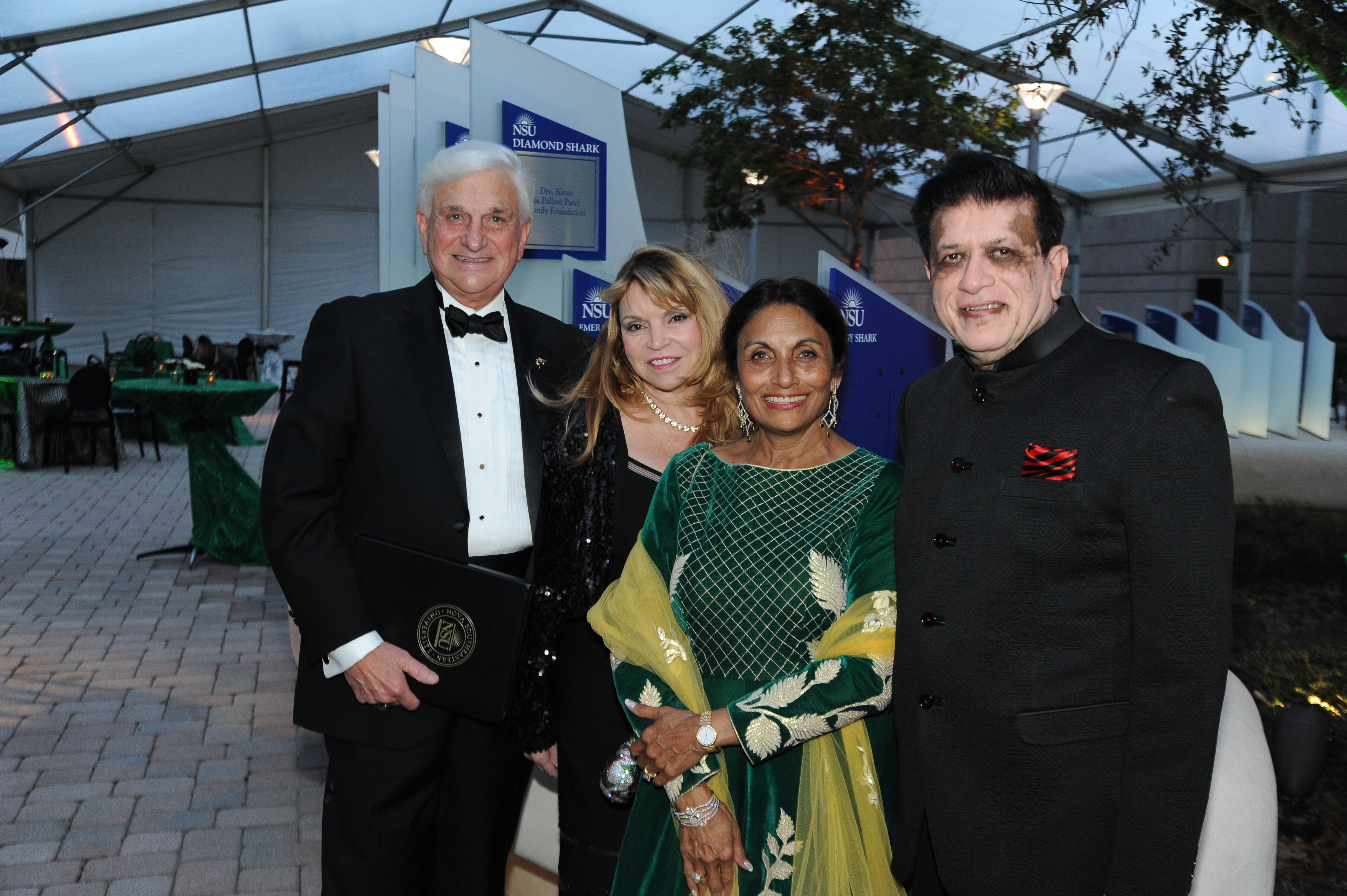 Dr. George Hanbury, NSU President; Jana Hanbury; Dr. Pallavi Patel and ...